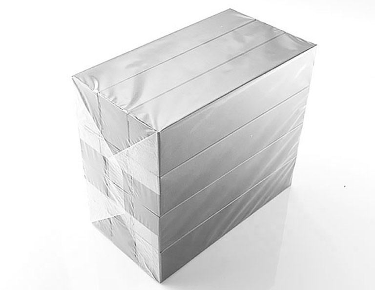 High-performance full overwrapping of folding carton bundles